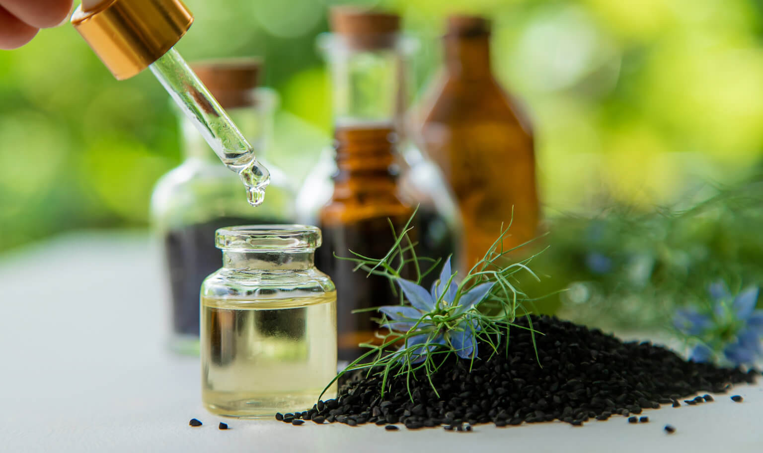 7 Surprising Benefits of Black Cumin Seed Oil - The Art of Anti-Aging